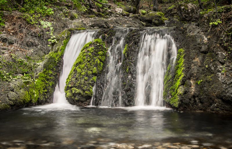 Man made waterfall stock image. Image of spout, serenity - 33786145