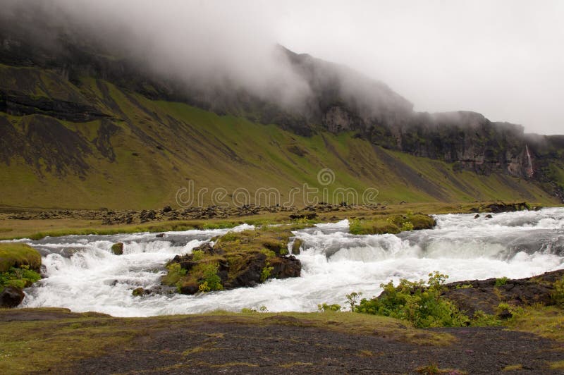 Small Waterfall with Cloudy Sky Stock Photo - Image of rock, structure ...