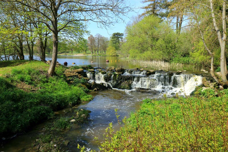 A Small Waterfall Flowing from a Lake in Kent Stock Photo - Image of ...