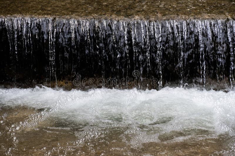 Small Waterfall with Flowing Water Stock Photo - Image of macro, creek ...