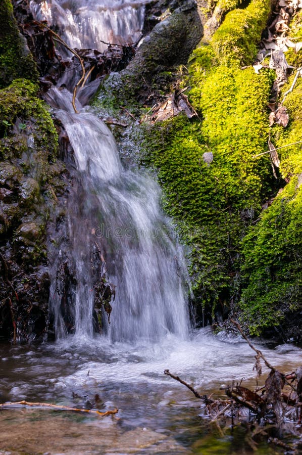 Small Waterfall in the Forest with Green Moss in Spring Spiritual ...
