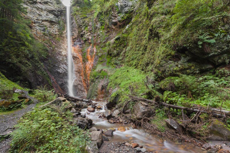 Small Waterfall among the Forest in Val Di Funes Stock Image - Image of ...