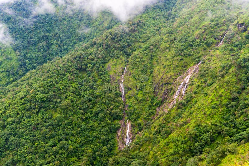 Small Waterfall on Green Mountain Ridge in Rain Forest Stock Photo ...