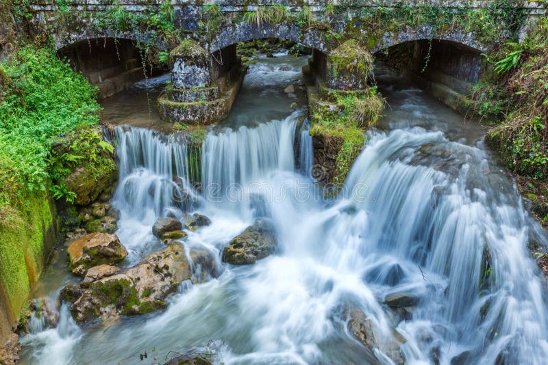 Small Waterfall at Mountain River Under the Old Bridge in Asturias ...
