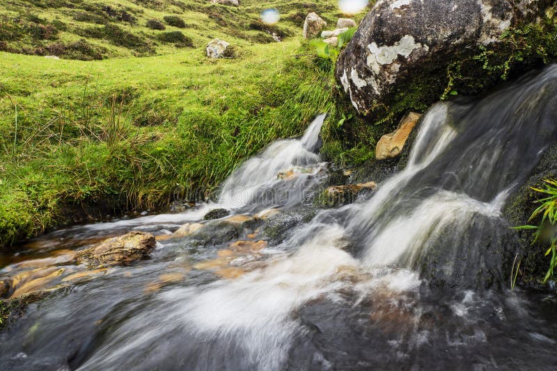 Small Waterfall in a Mountains. Beautiful Nature Scenery Stock Photo ...