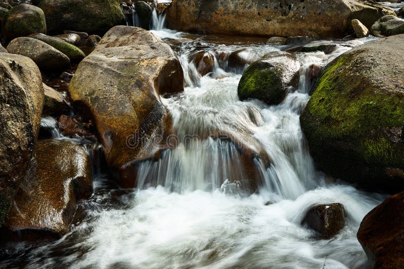 A Small Waterfall in a Natural Stream Stock Image - Image of stone ...