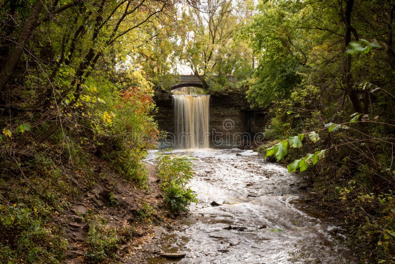 Small waterfall in nature stock photo. Image of flowing - 196677404