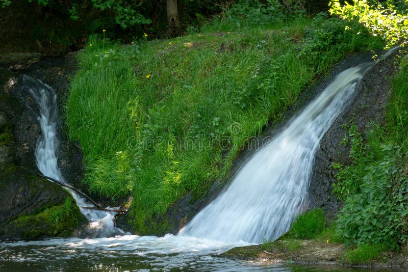 Small waterfall in nature stock image. Image of water - 116483761