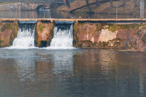 Small Waterfall on River Dam in Public Park Stock Photo - Image of ...