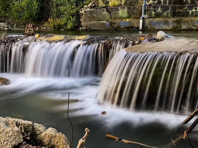 A Small Waterfall in a River with a Fairly Fast Flow Stock Photo ...