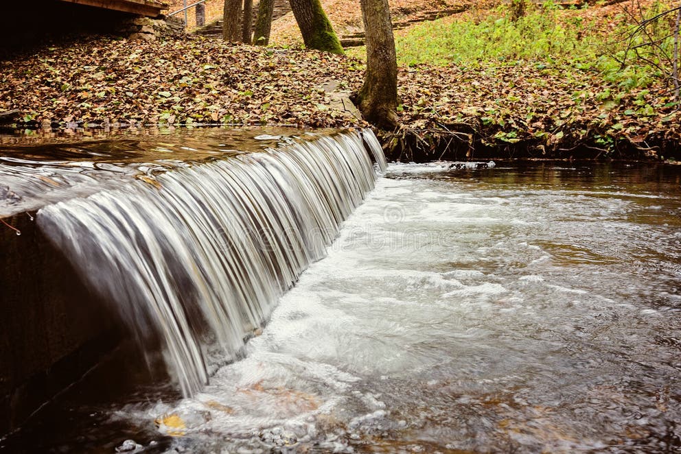 Small Waterfall River in the Forest. Spring Water Flow Stock Photo ...