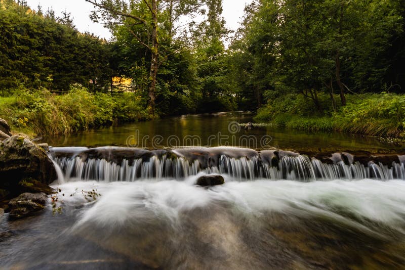 Small Waterfall on Small River in Golden Mountains Stock Image - Image ...