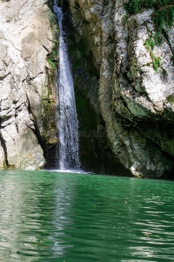 Small Waterfall from the Rock Cliff in the National Park Stock Photo ...