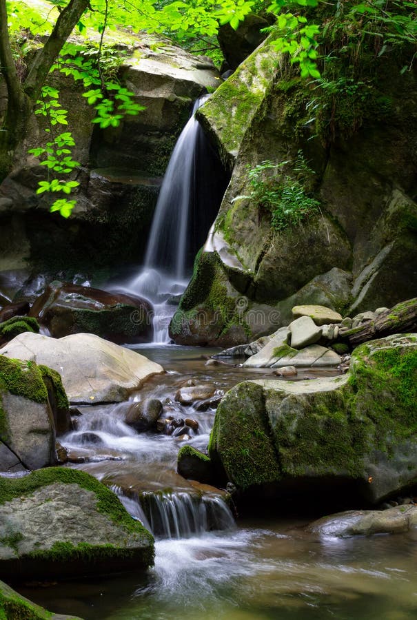 Small Waterfall among the Rocks Stock Image - Image of pour, flow ...