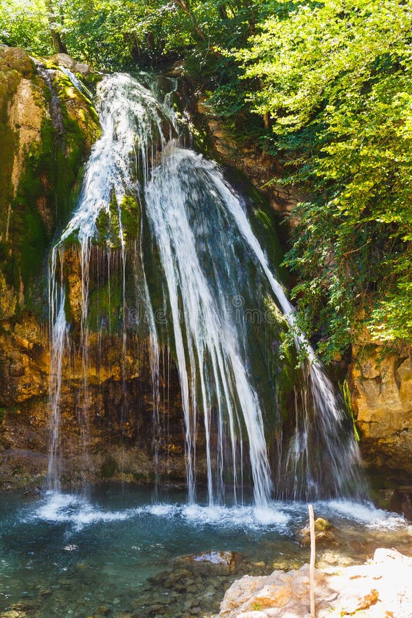 A Small Waterfall in the Rocks. Nature Reserve Stock Image - Image of ...