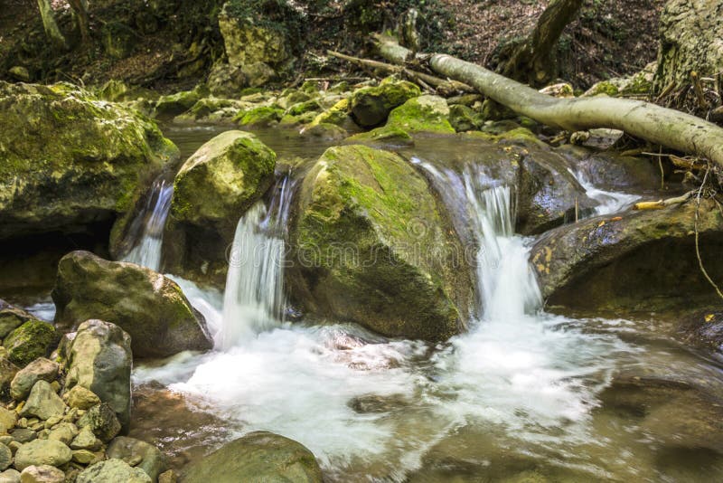 A Small Waterfall on a Shallow Mountain River Close Up Stock Image ...