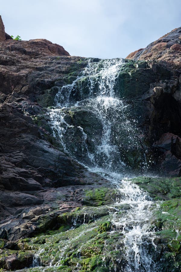 Small waterfall stock image. Image of landscape, plant - 370579007