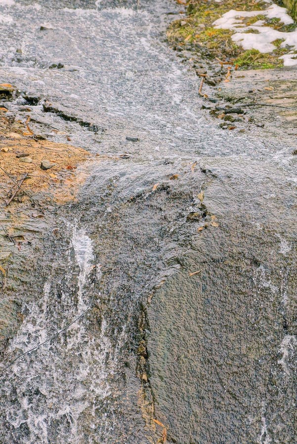 Small Waterfall Stream of Water Flowing Down Grey Stone Wall Stock ...