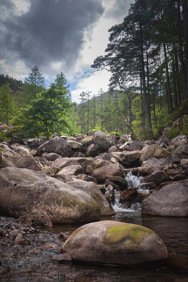 Small Waterfall Trickling Downstream in a Boulder Ridden Gulley Stock ...