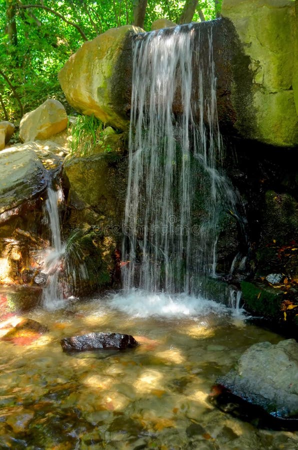 Small waterfall stock image. Image of bottom, sandy - 101853129