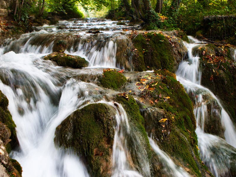 Small Waterfall, Water Stream between Rocks and Grass Stock Image ...