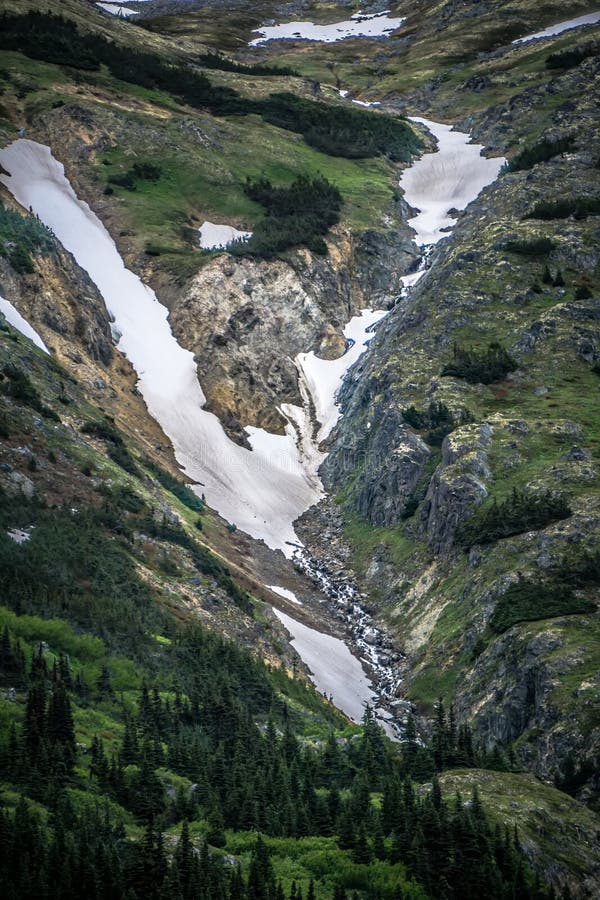 Small Waterfalls on Mountain Slopes in Alaska Mountains Stock Image ...