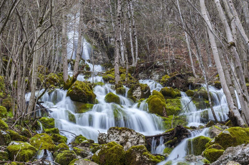 Small Waterfalls Running Over Moss-covered Rocks Stock Image - Image of ...