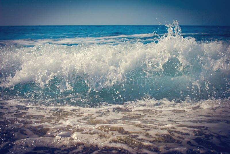 A Small Wave Going Ashore with Foam Stock Image - Image of shoreline ...