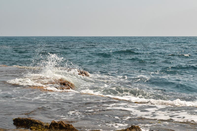 Small Wave Running on the Rocky Beach. - Image Stock Photo - Image of ...
