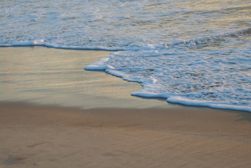 Small Wave on Sunset Beach Hitting the Shore Stock Photo - Image of ...