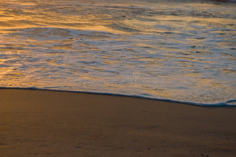 Small Wave on Sunset Beach Hitting the Shore Stock Photo - Image of ...