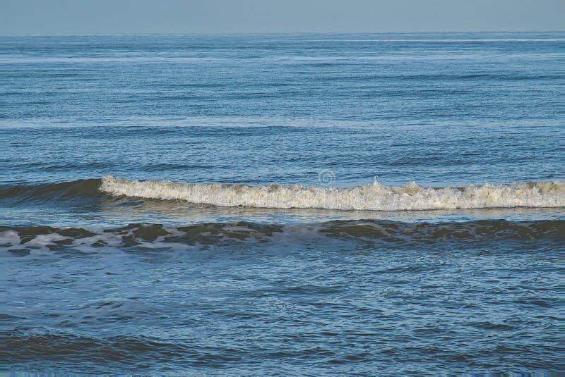 Small waves stock photo. Image of wind, season, clouds - 129450666