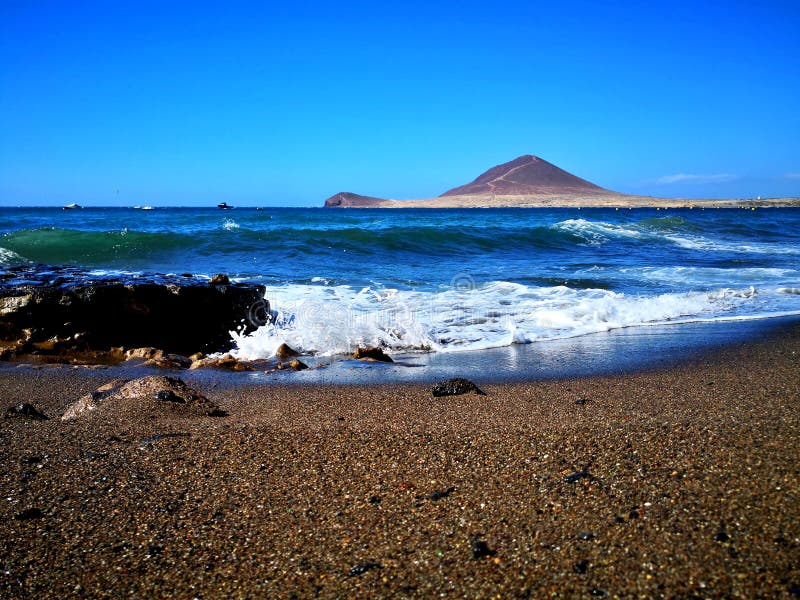 El Medano, Playa Chica stock image. Image of rocks, mountain - 161787555
