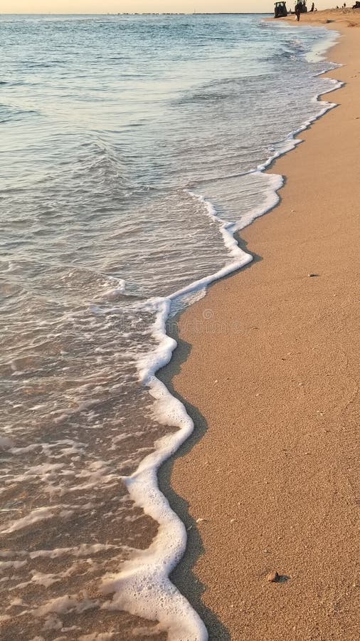 Small Waves Hitting the Beach Line Stock Photo - Image of waves, crabs ...