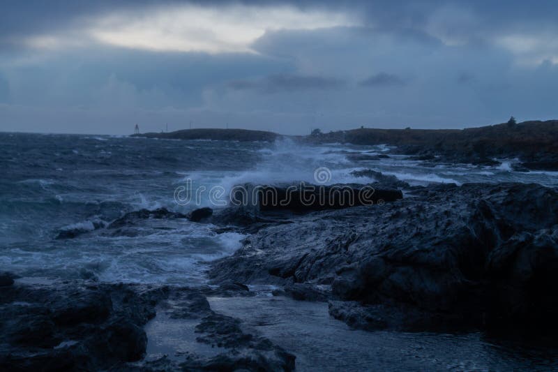 Waves from Ocean Hitting Rocks with Clouds Stock Photo - Image of coast ...