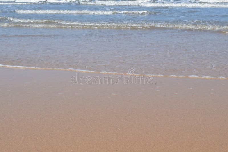 Small Waves of Rising and Falling Tide on the Beach Stock Image - Image ...
