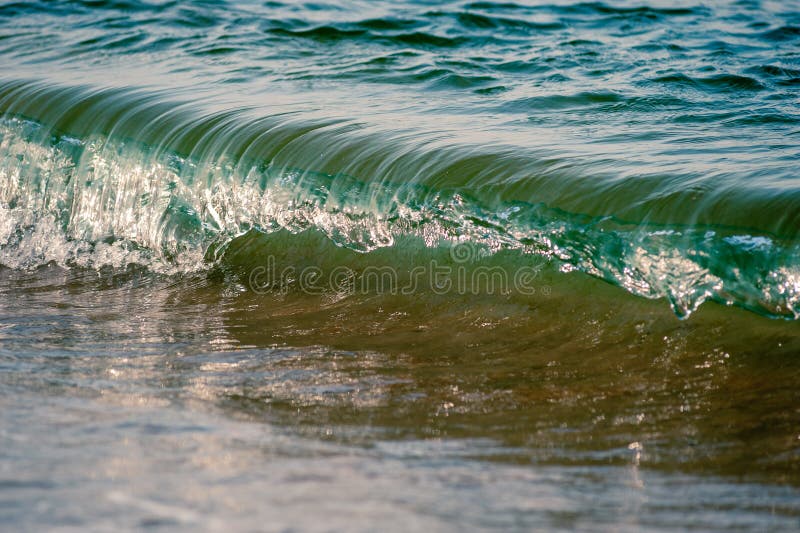 Small Waves Rolling Onto a Sandy Beach Stock Photo - Image of ...