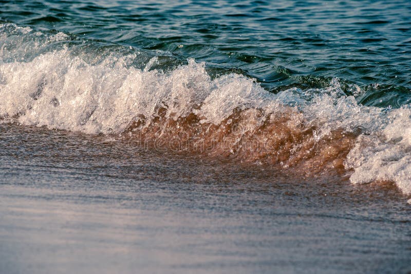 Small Waves Rolling Onto a Sandy Beach Stock Photo - Image of peace ...
