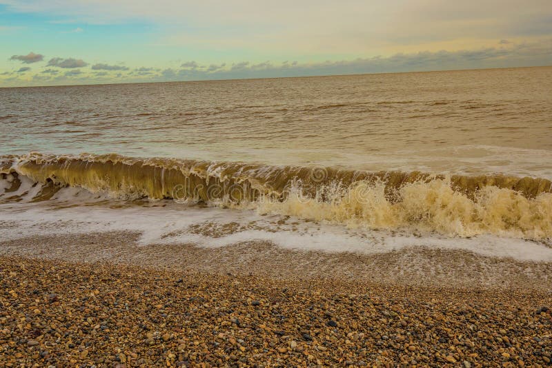 Small Waves Rolling in on the Shingle Beach Stock Image - Image of ...
