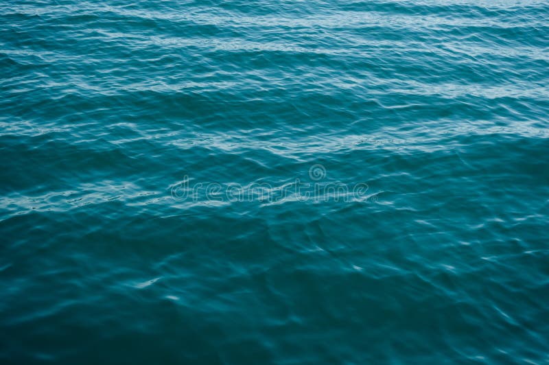 Small Waves on the Surface of the Water Stock Photo - Image of liquid ...