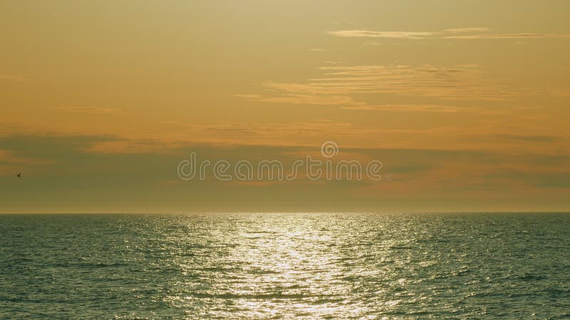 Small Waves on Water Surface with Suns Rays. Natural Background with ...