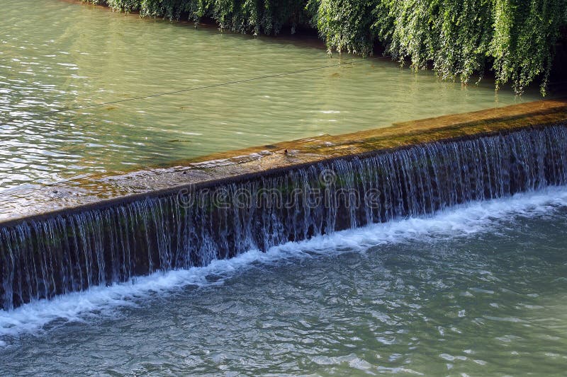Weir or Dam To Slow Down the Flow of Water in the River. Stock Photo ...