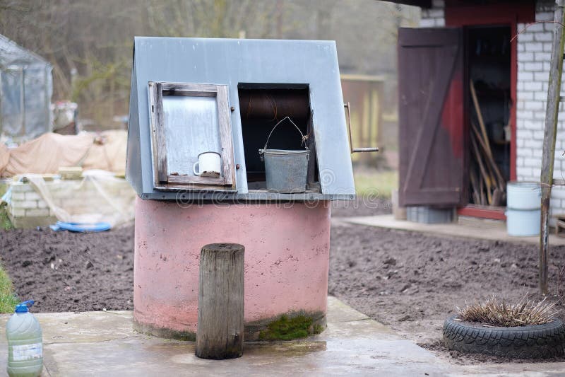 A Small Well for Water in the Backyard Stock Photo - Image of small ...