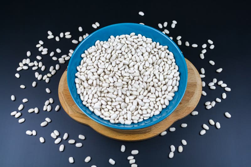 Small White Beans on the Green Plate and Wooden Board. White Beans Top ...