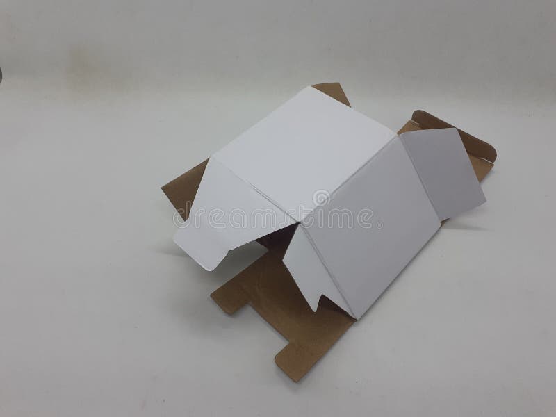 A Small White Foldable Paper Boxes in White Isolation Background Stock ...