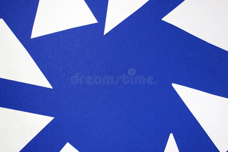 Small White Paper Sheets with Sharp Corners Lie on a Blue Background ...