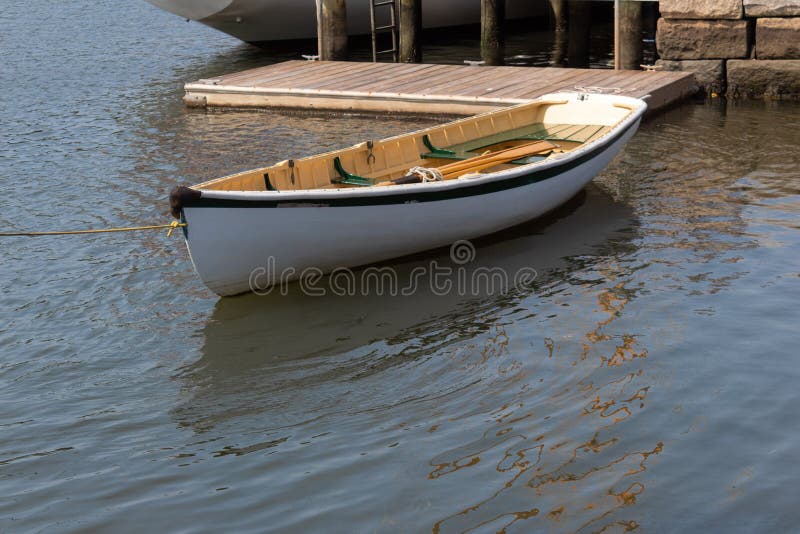 Old rowboat by the dock. stock photo. Image of wood - 101405338