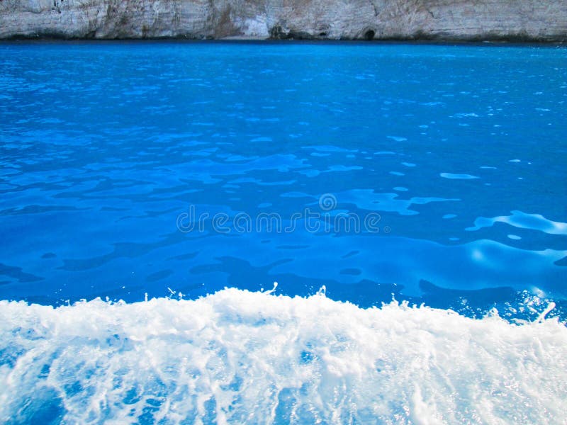 Small White Waves on Bright Blue Water Stock Image - Image of wave ...