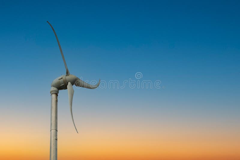 Small Wind Turbine in Sunset Sky, Clean Energy for People Stock Image ...