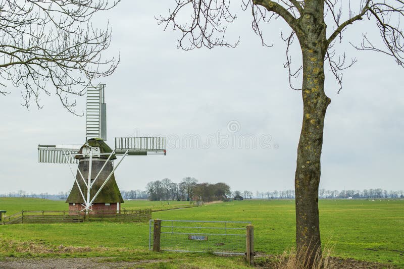 Small Windmill on the Beach Stock Photo - Image of greece, culture ...